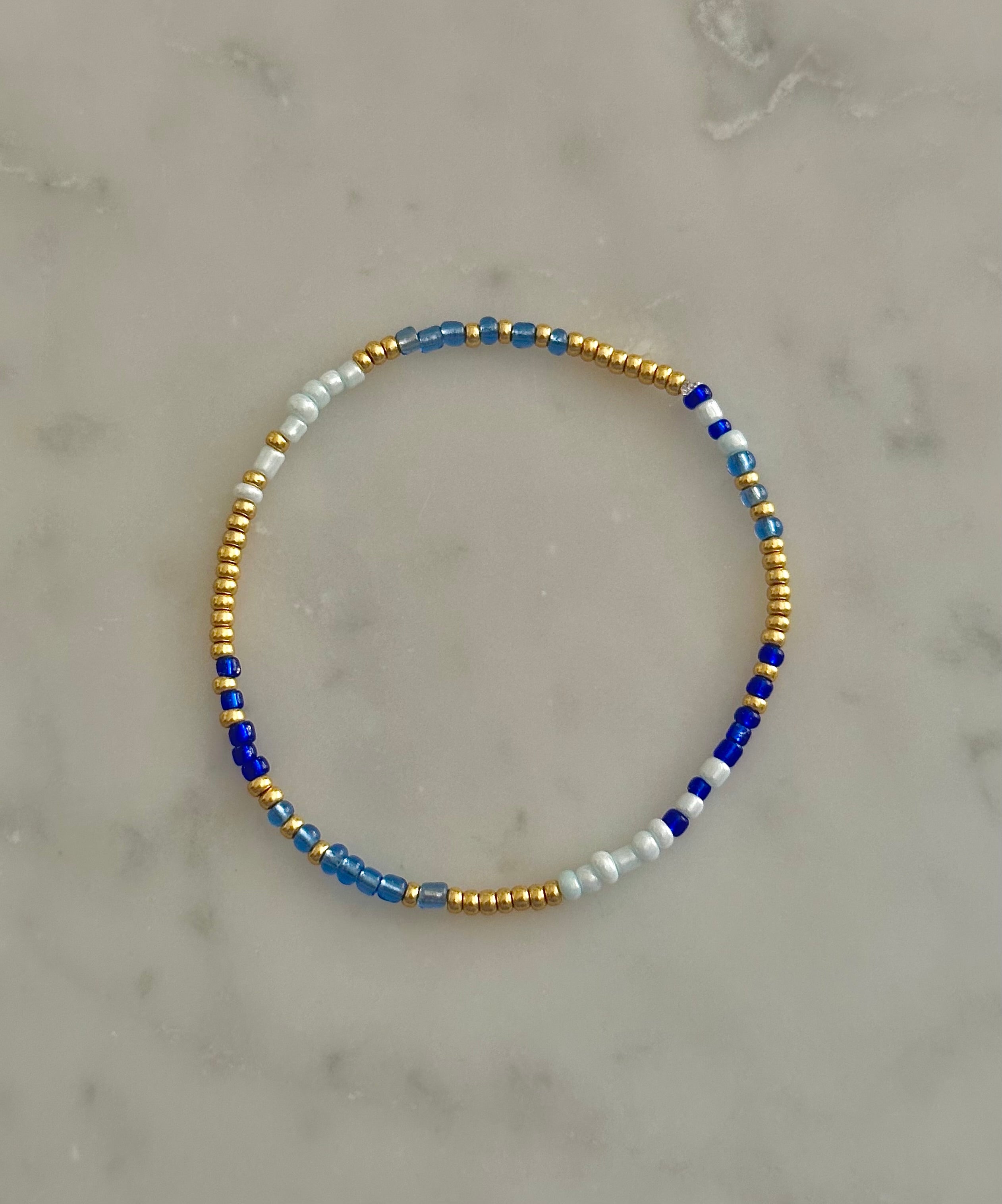 gold stacking bracelets – ivory moon